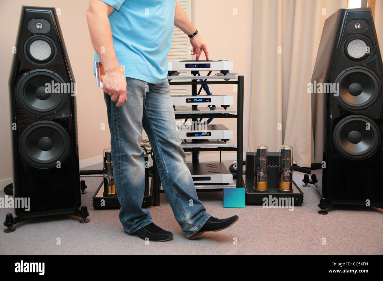 Man and hi-end audio system Stock Photo - Alamy