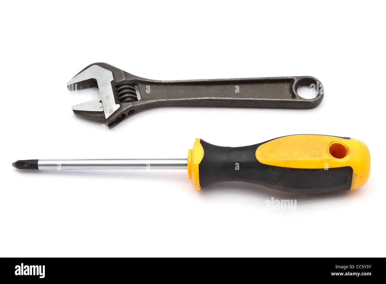 Screwdriver and wrench closeup on white background Stock Photo - Alamy