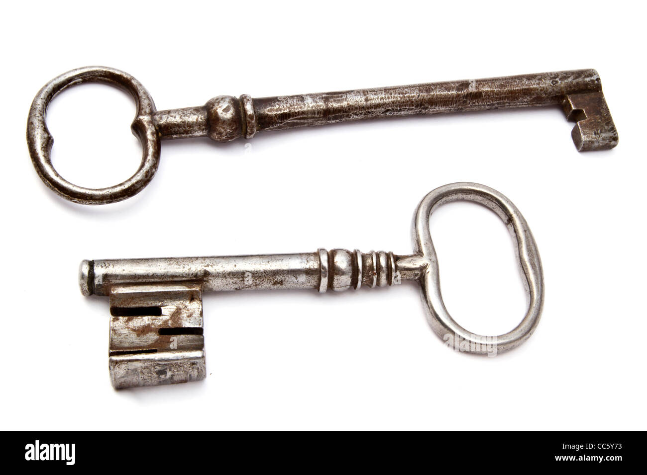 Old key isolated on white background Stock Photo - Alamy