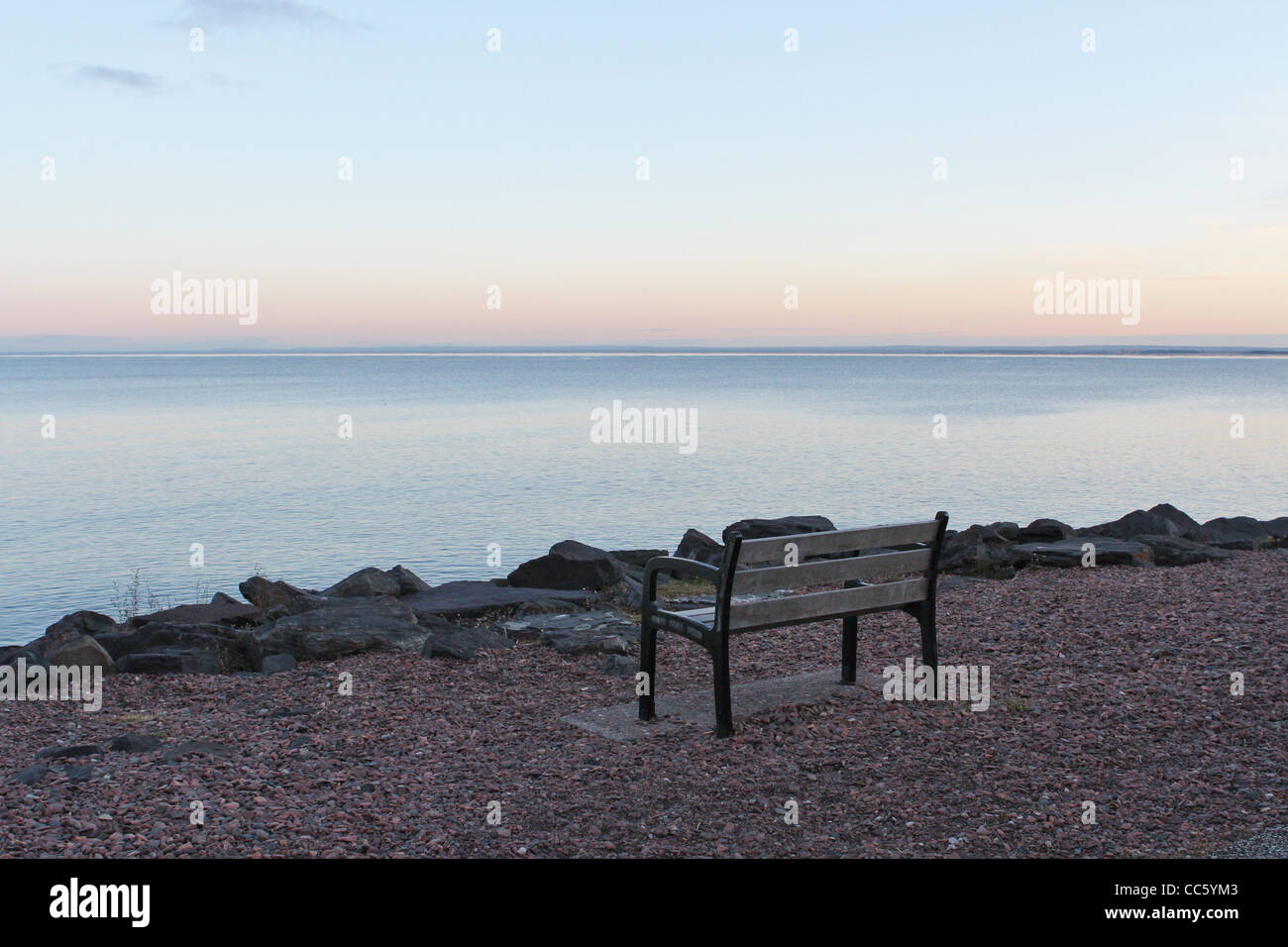 An empty bench facing Lake Superior in winter Stock Photo - Alamy