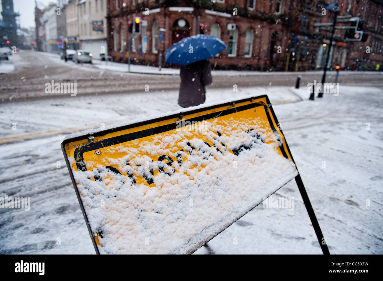 Heavy snow falls on Perth town centre, covering road signs as seen the ...
