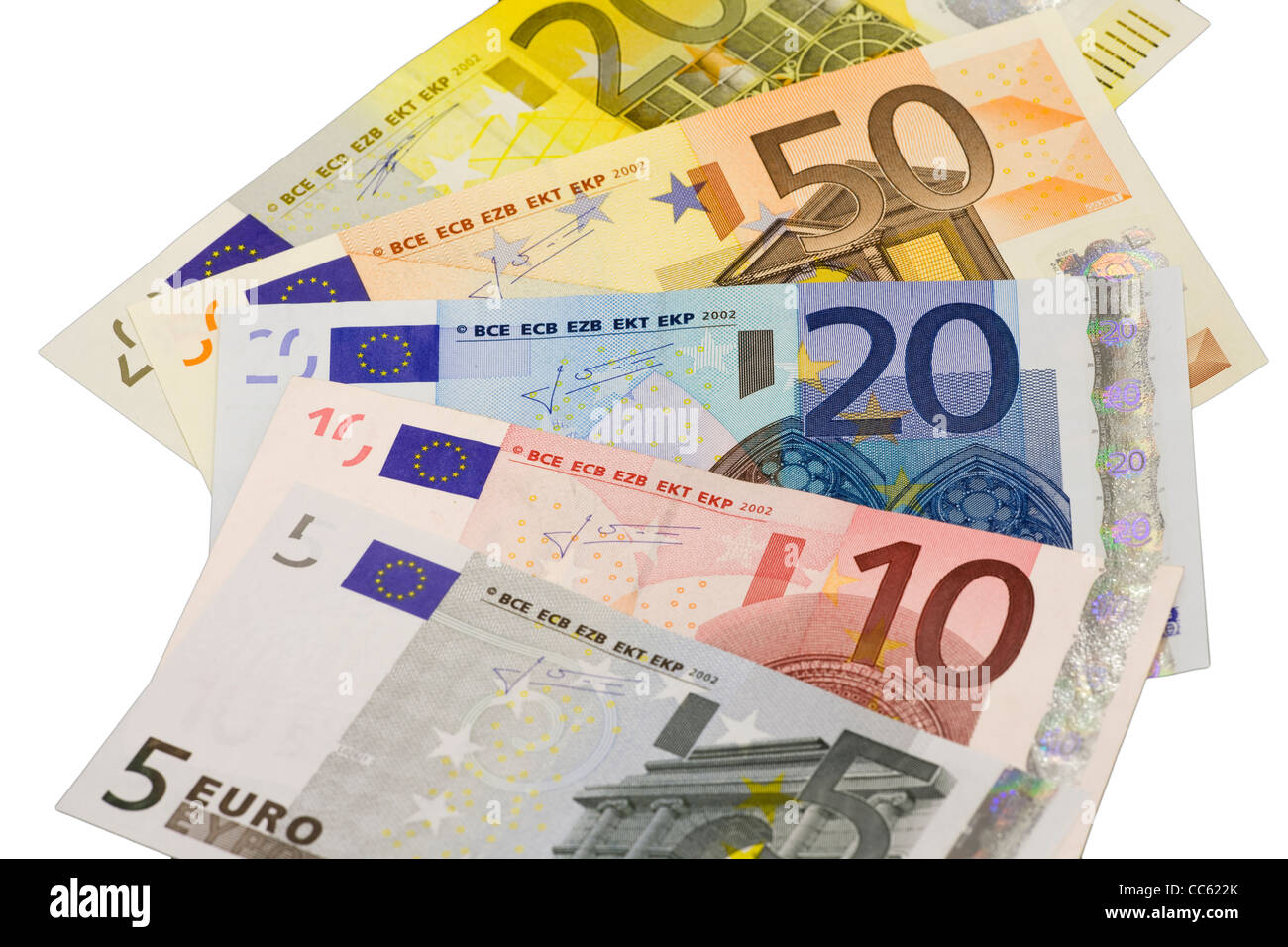 Euro banknotes widespread in front of white background Stock Photo - Alamy