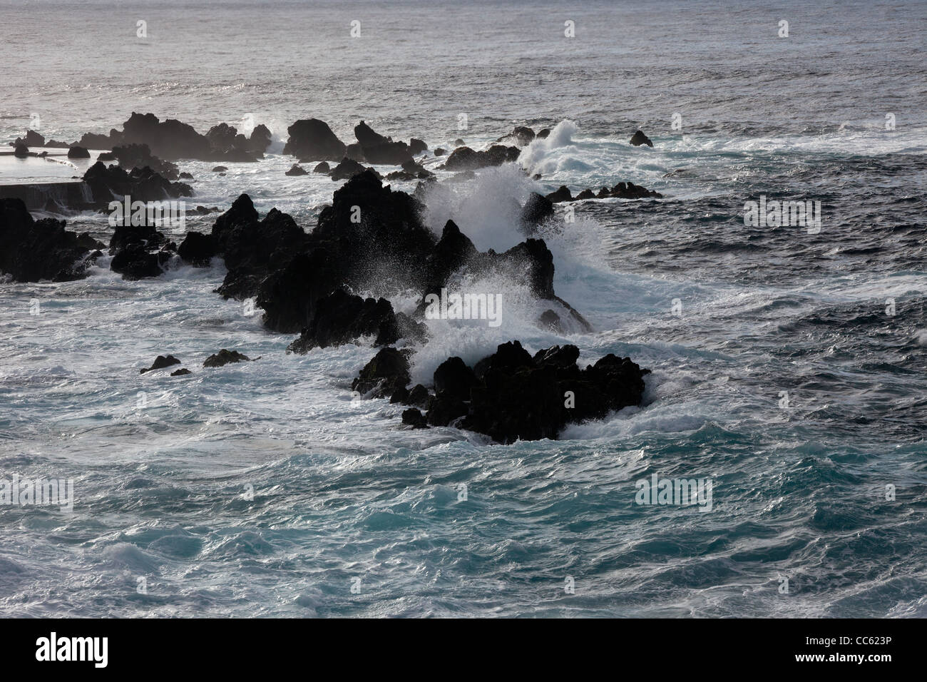 Sea scenery with a rock Stock Photo - Alamy