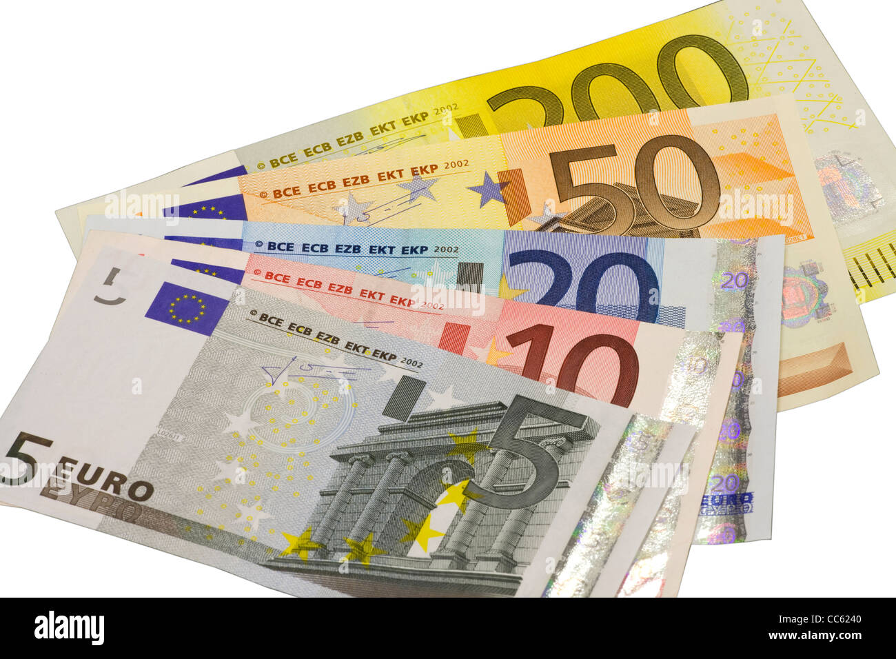 Euro banknotes widespread in front of white background Stock Photo - Alamy