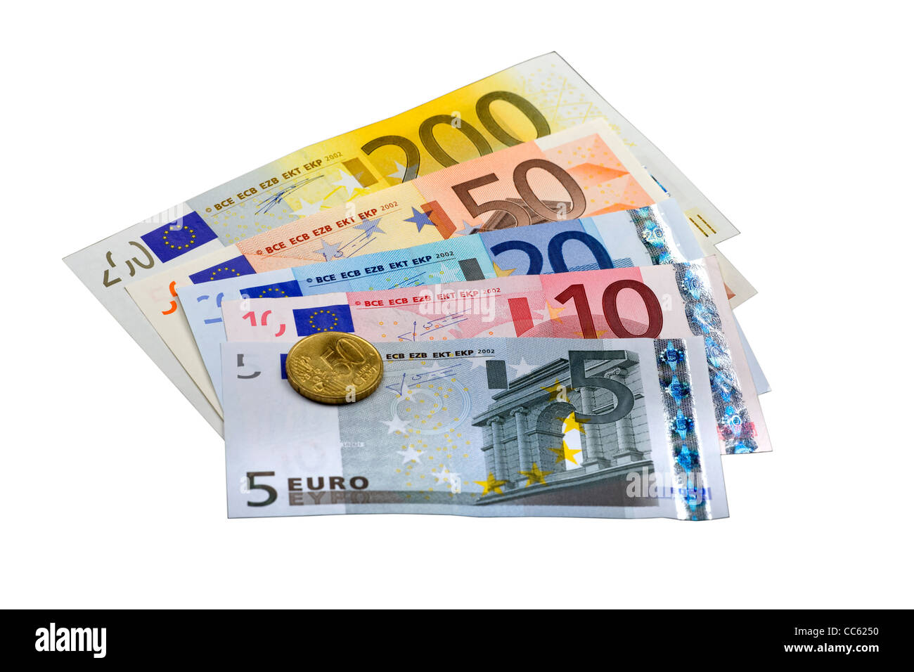 Euro bank notes and coins in front of white background Stock Photo - Alamy