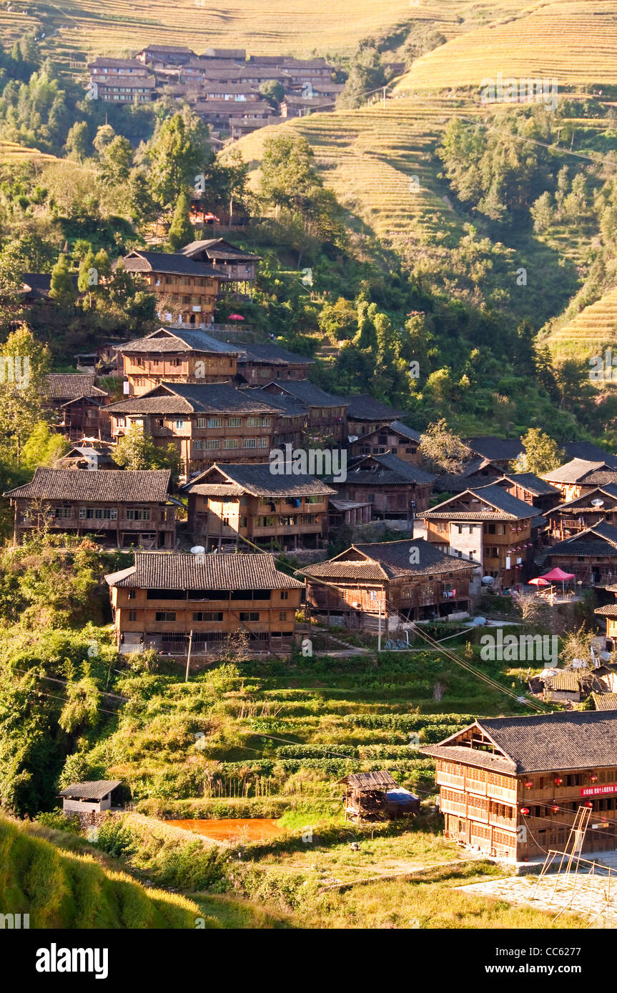 Traditional village in Longji terraces rice fields near Guilin, Guangxi ...