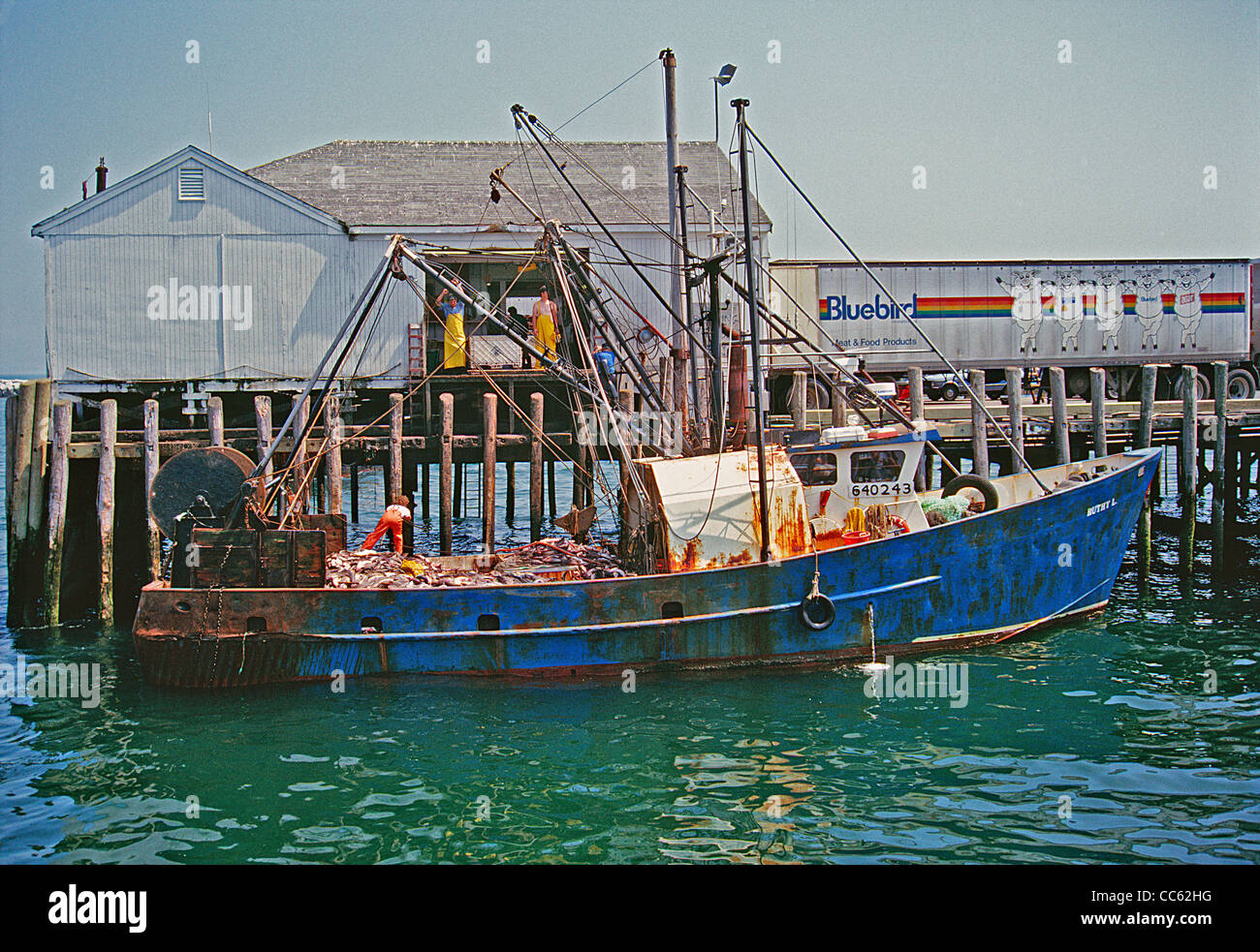 Trawler pier fishermen poles hi-res stock photography and images - Alamy