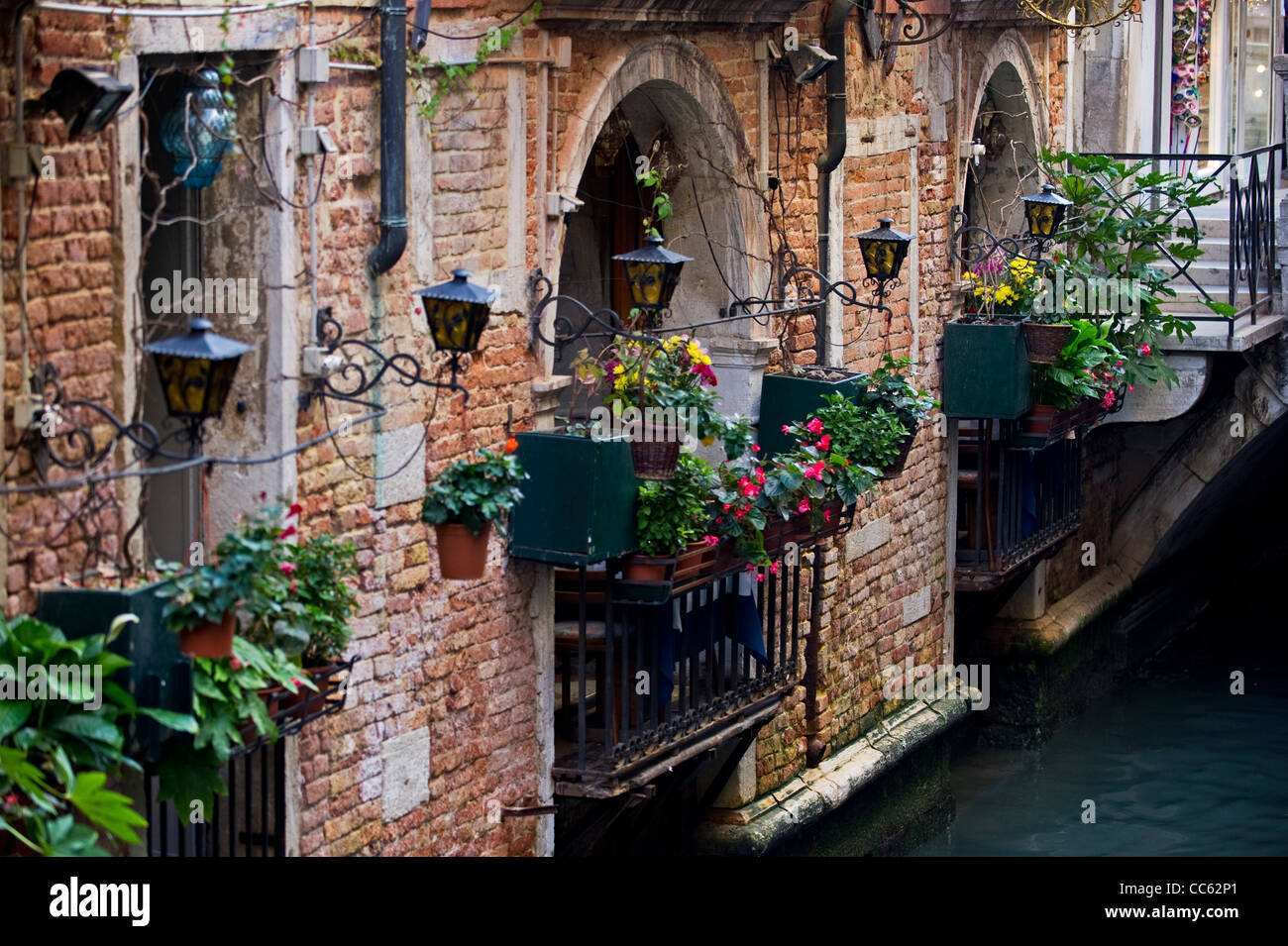 Balcony Tables in a Canalside Restaurant Stock Photo - Alamy