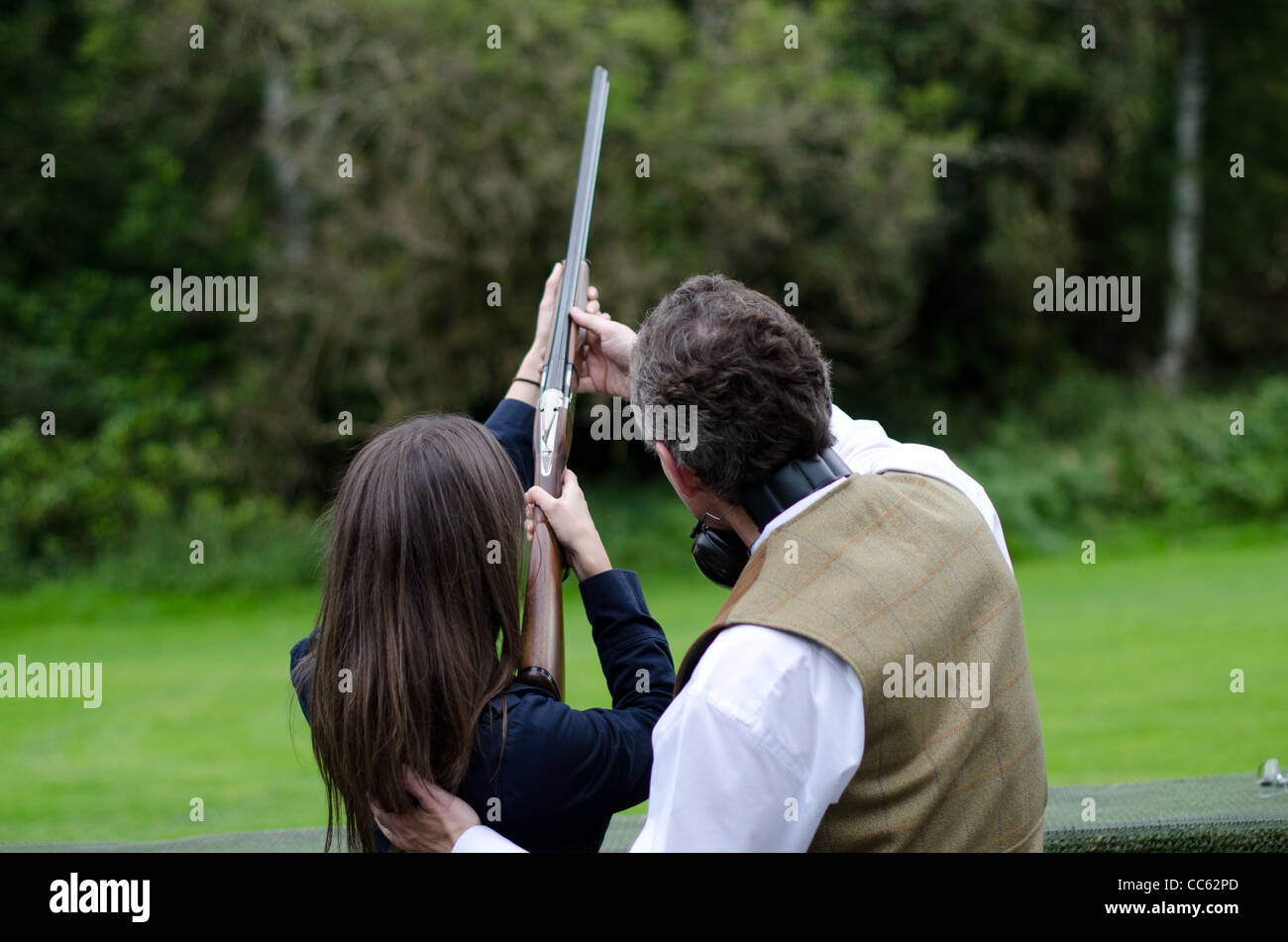 Lady shooting lesson hi-res stock photography and images - Alamy