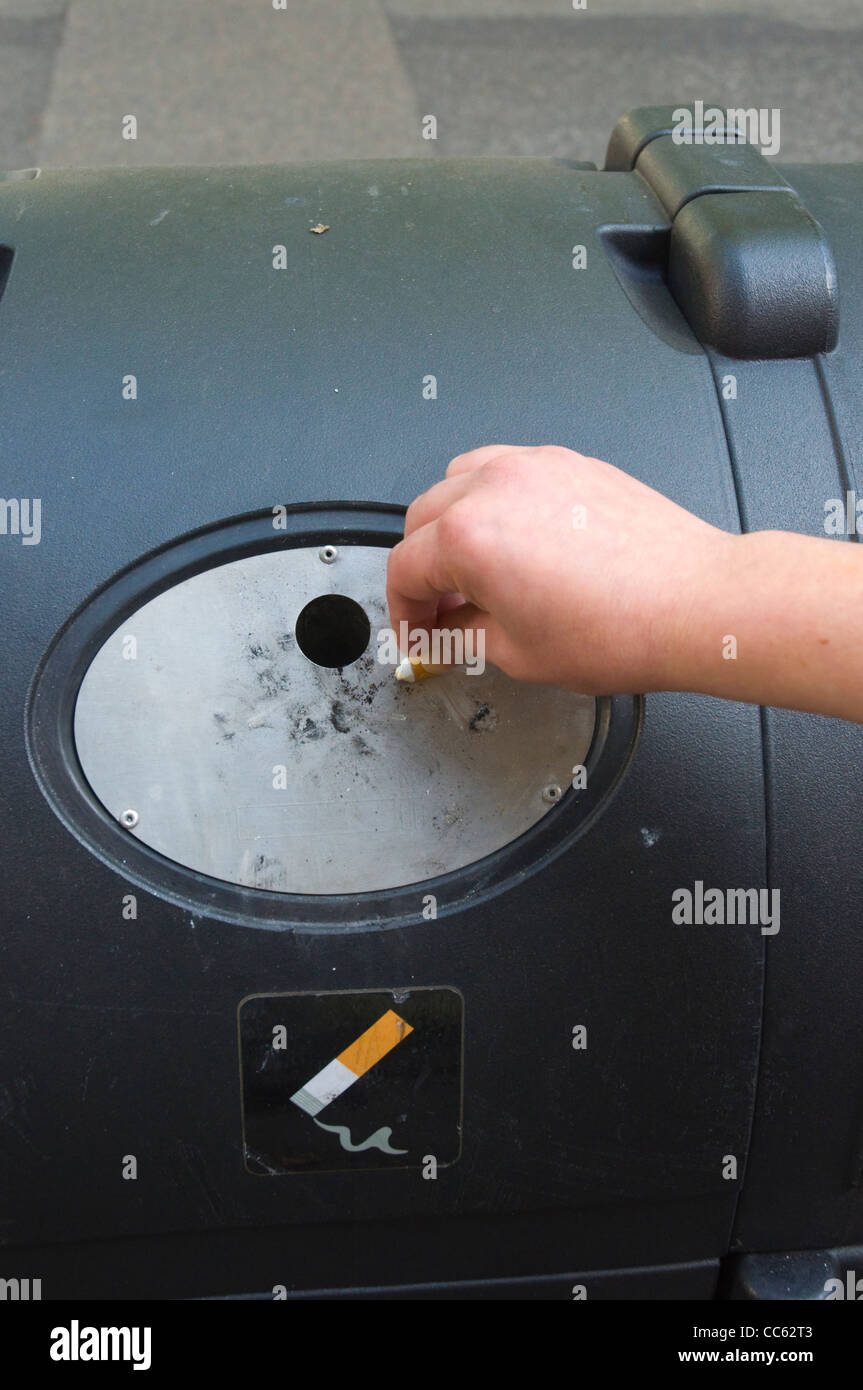 Person put out cigarette hi-res stock photography and images - Alamy