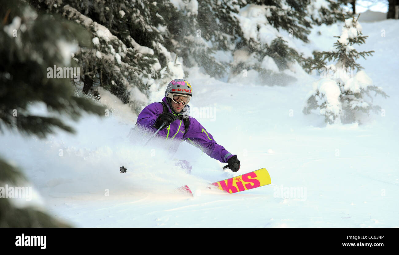Skier on deep snow hi-res stock photography and images - Alamy