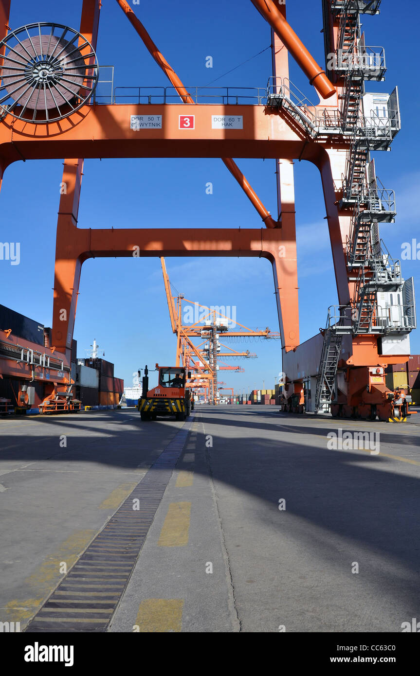 container terminal, cranes and lorries Stock Photo - Alamy