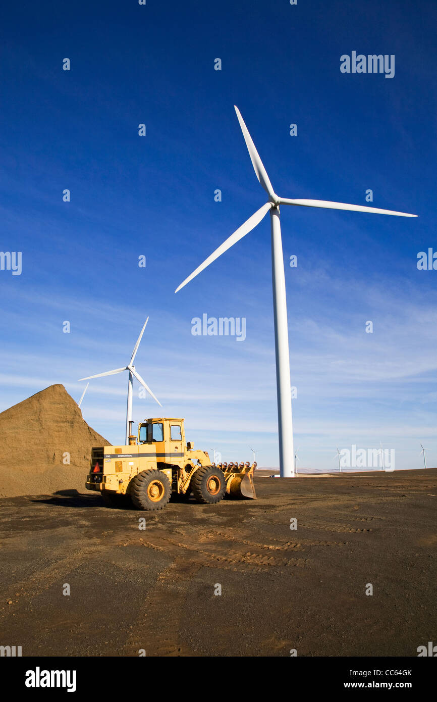 Wind turbines dot the horizon at wind farms along the Columbia River ...