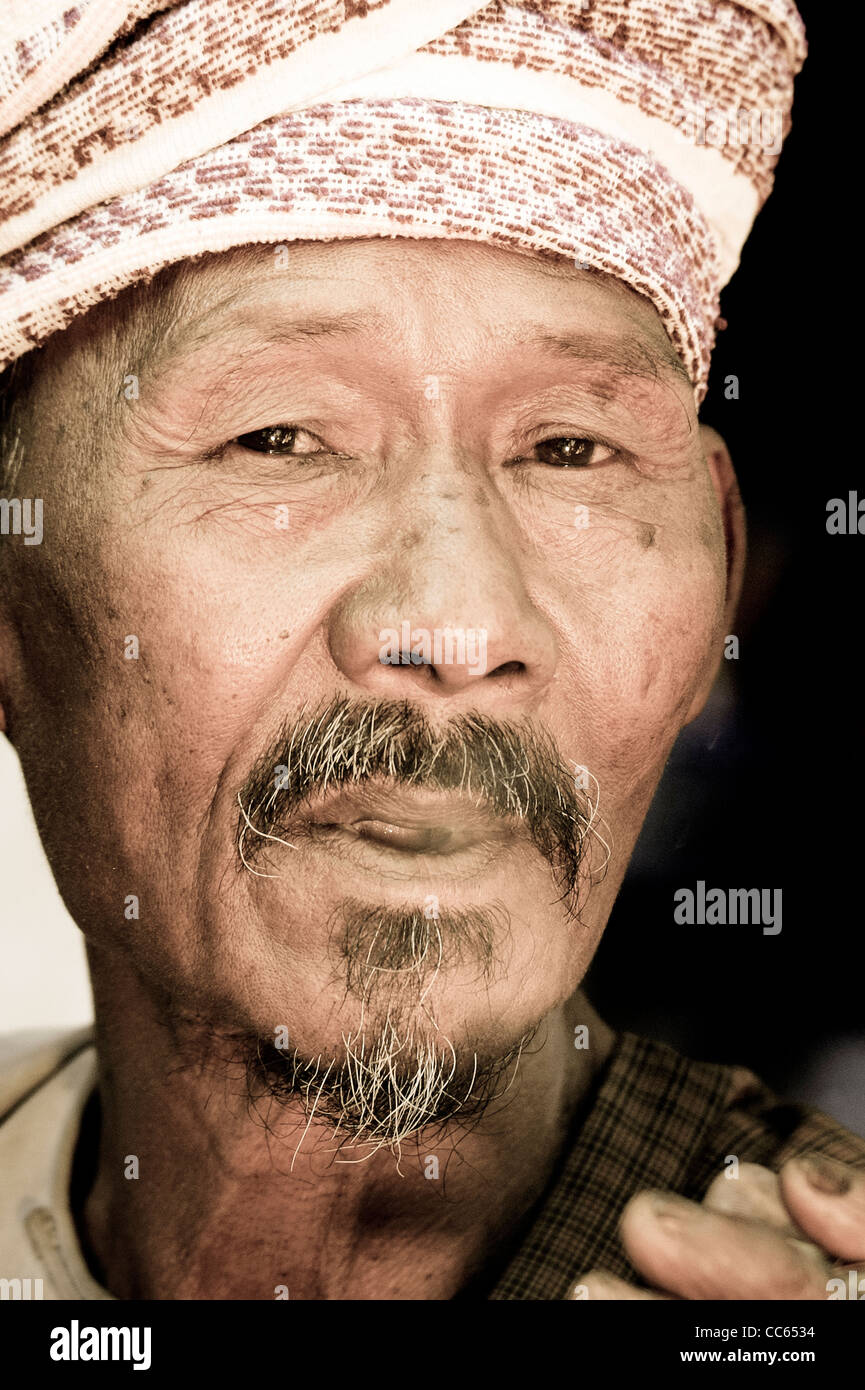 Portrait of a Burmese man at the local market of Maymyo ( Pyin U Lwin ...