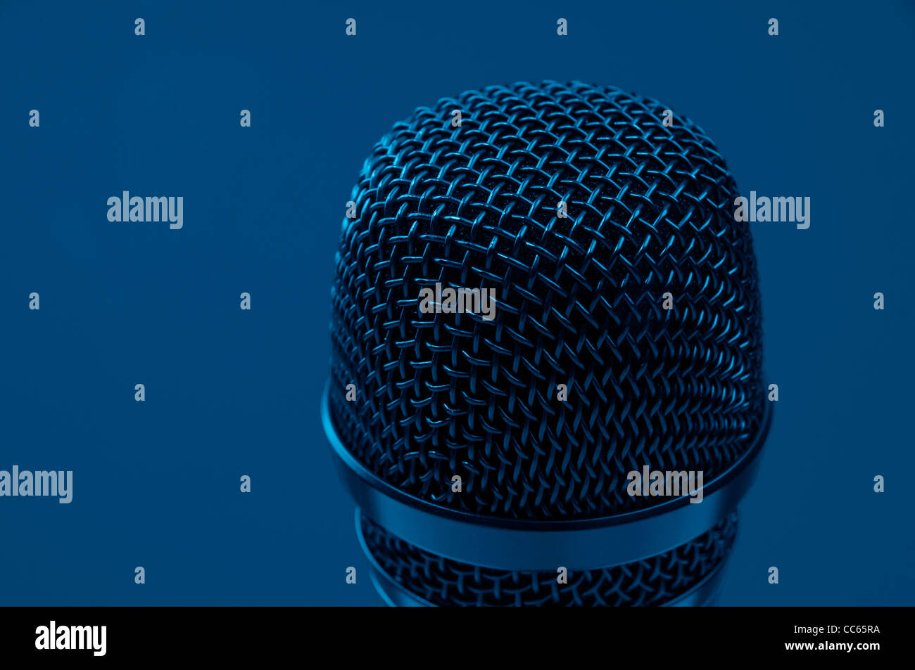 Microphone closeup, blue toned Stock Photo - Alamy