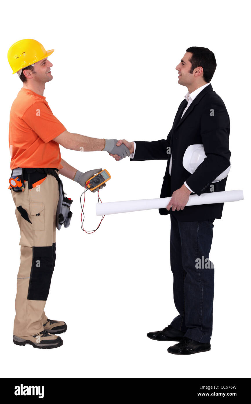 Architect and electrician shaking hands Stock Photo - Alamy