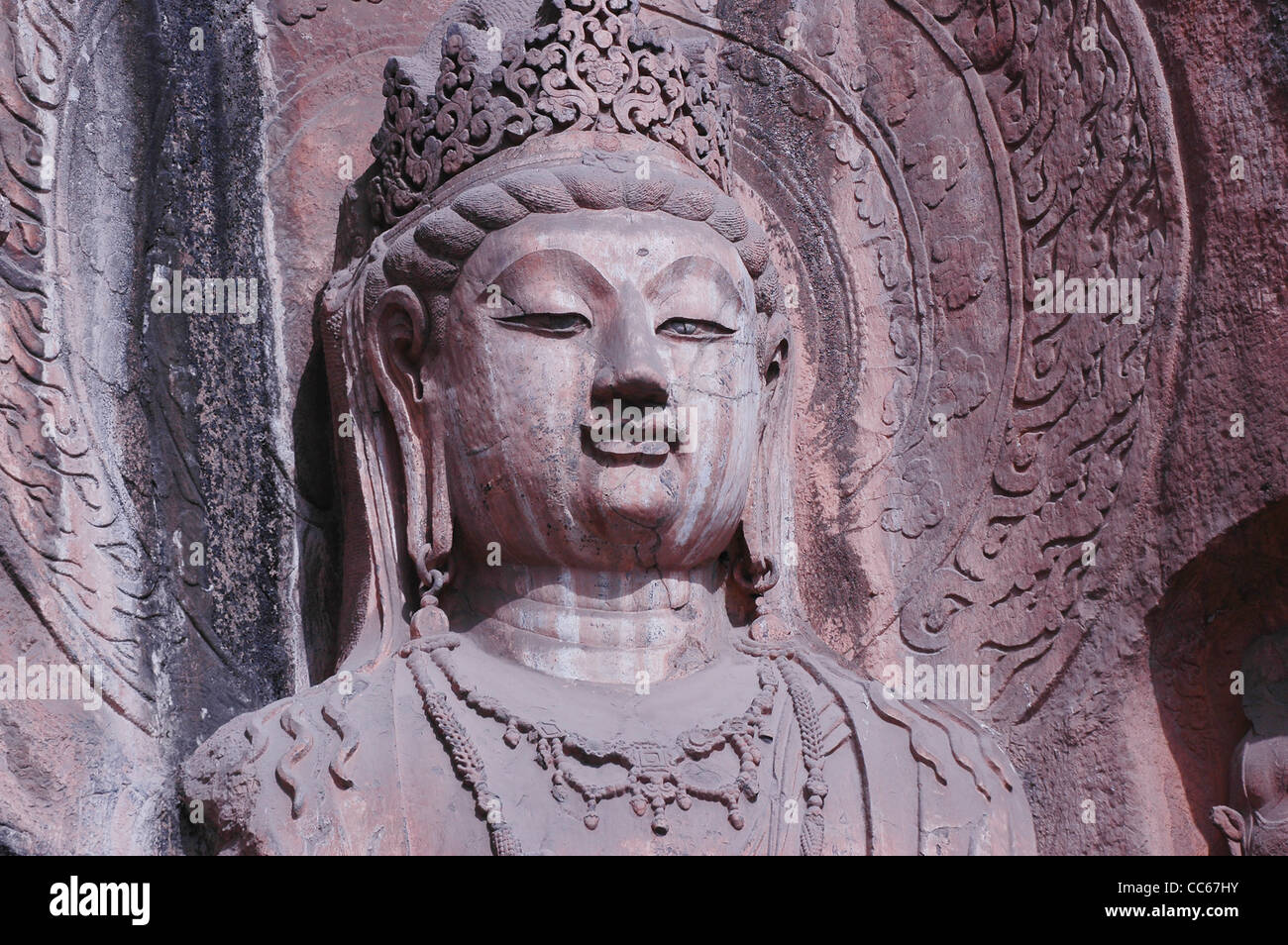 Buddha statue, Longmen Grottoes, Luoyang, Henan , China Stock Photo - Alamy