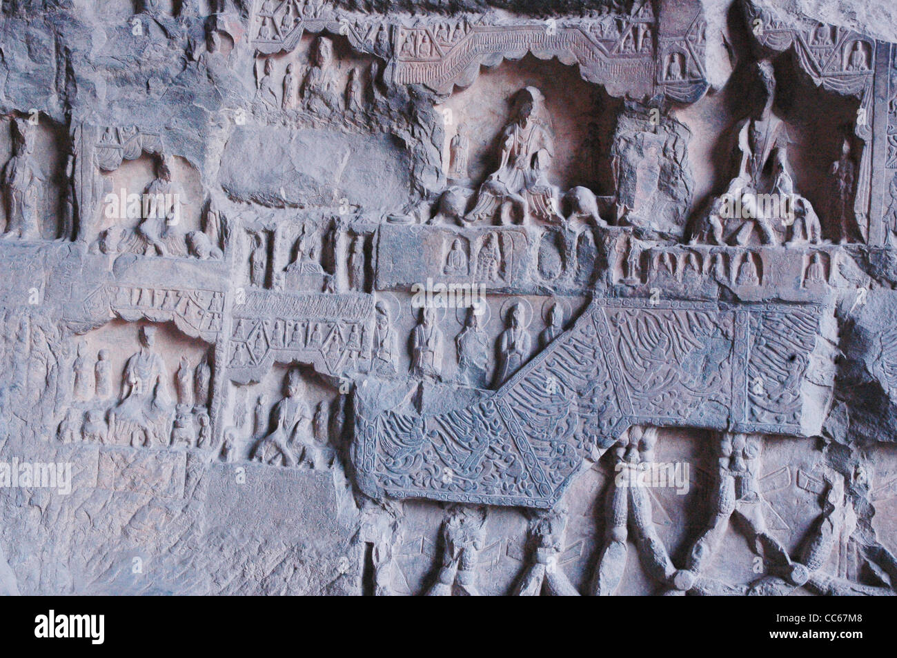 Stone wall carved with Buddha, Longmen Grottoes, Luoyang, Henan , China ...