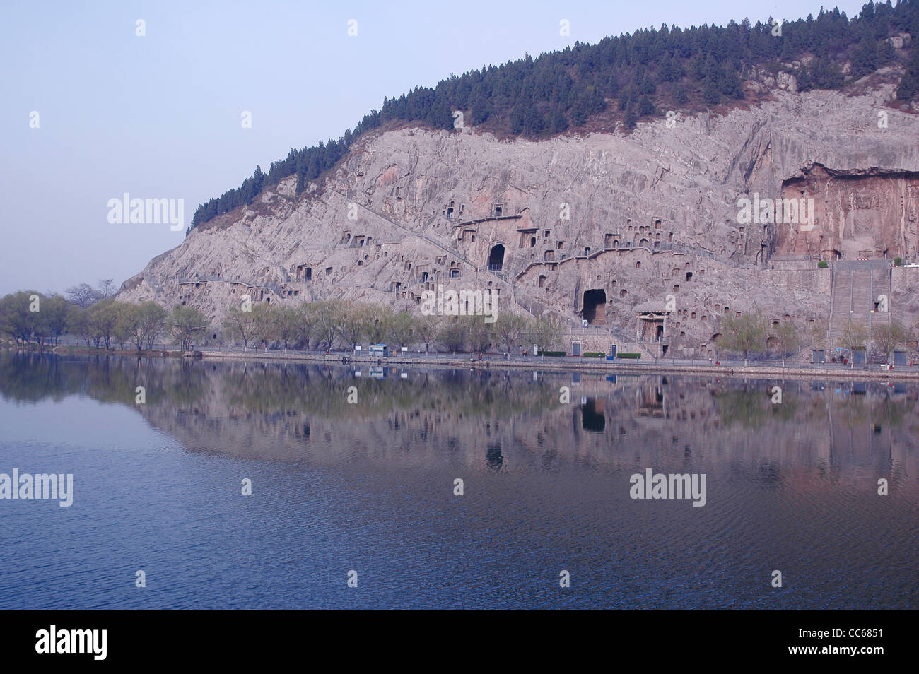 Rocky moutain with lots of caves, Longmen Grottoes, Luoyang, Henan ...