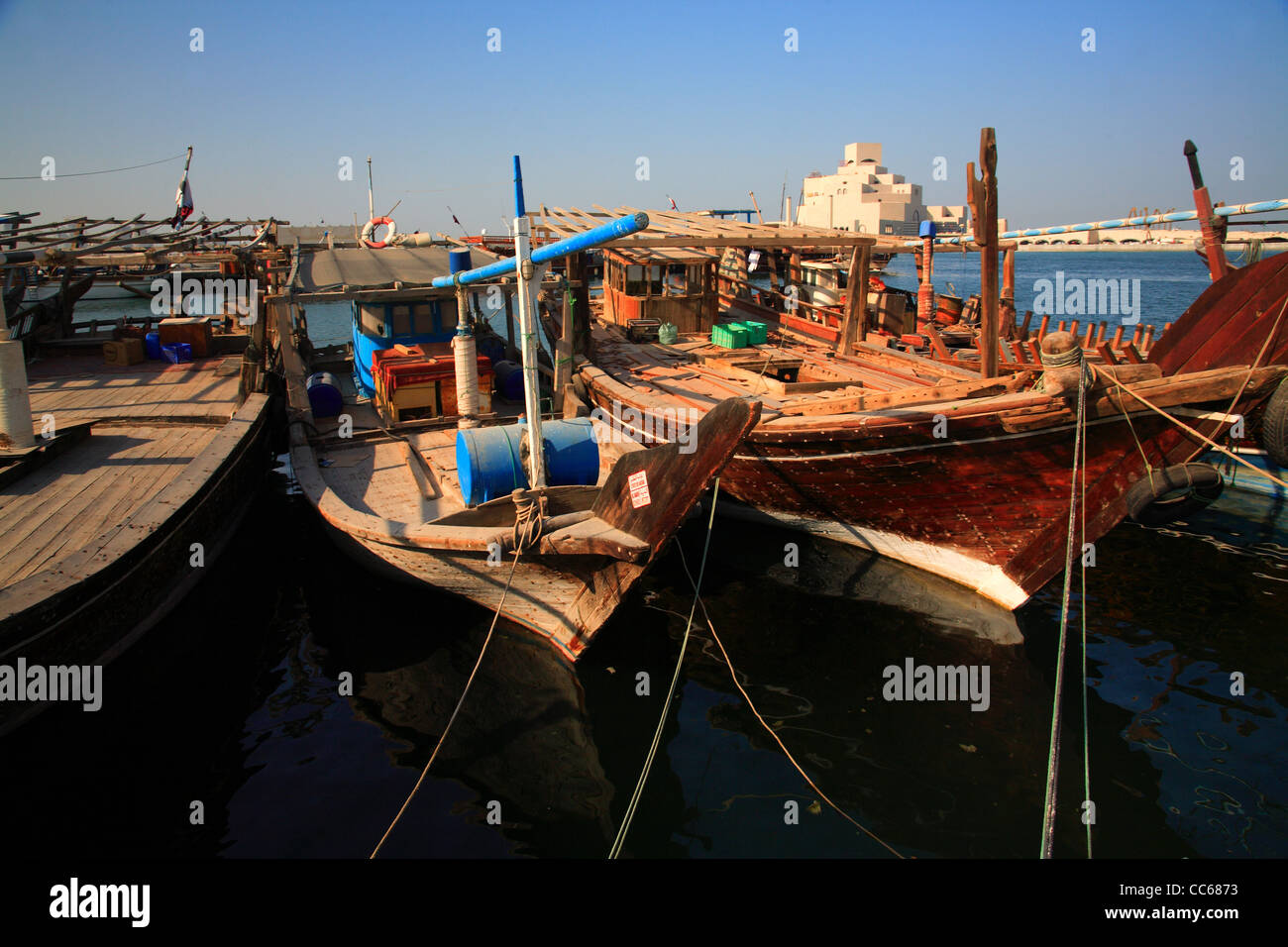 Doha harbour traditional wooden fishing boats known as dhow Stock Photo ...