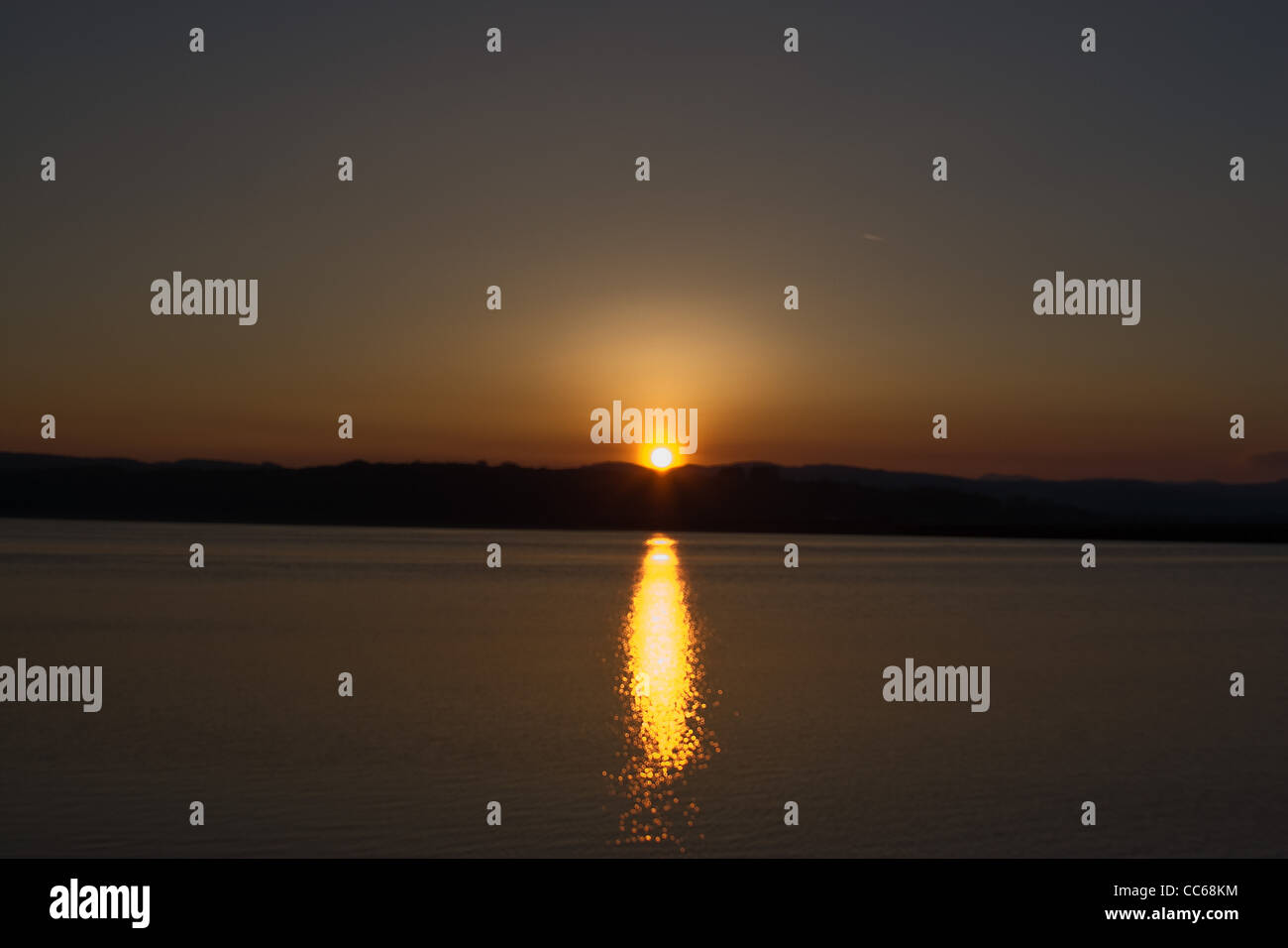 Sun setting over river hi-res stock photography and images - Alamy