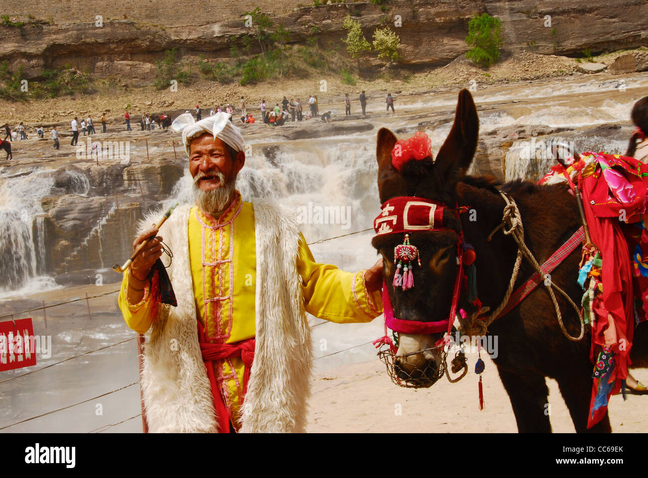 Old man with his donkey, Hukou Waterfall, Yanan, Shaanxi , China Stock ...