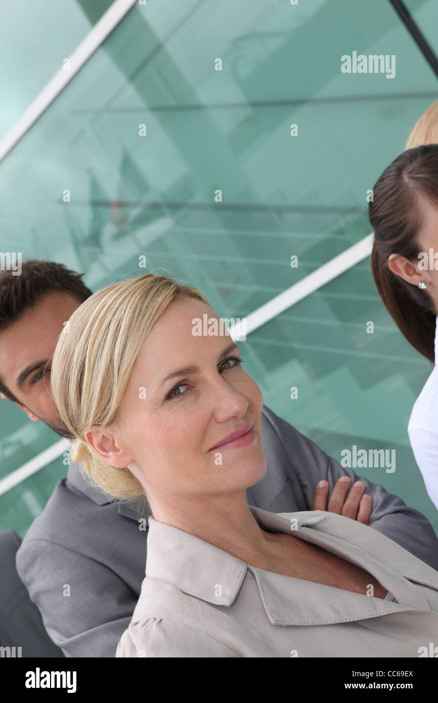 Headshot smart happy workers outside office building Stock Photo - Alamy