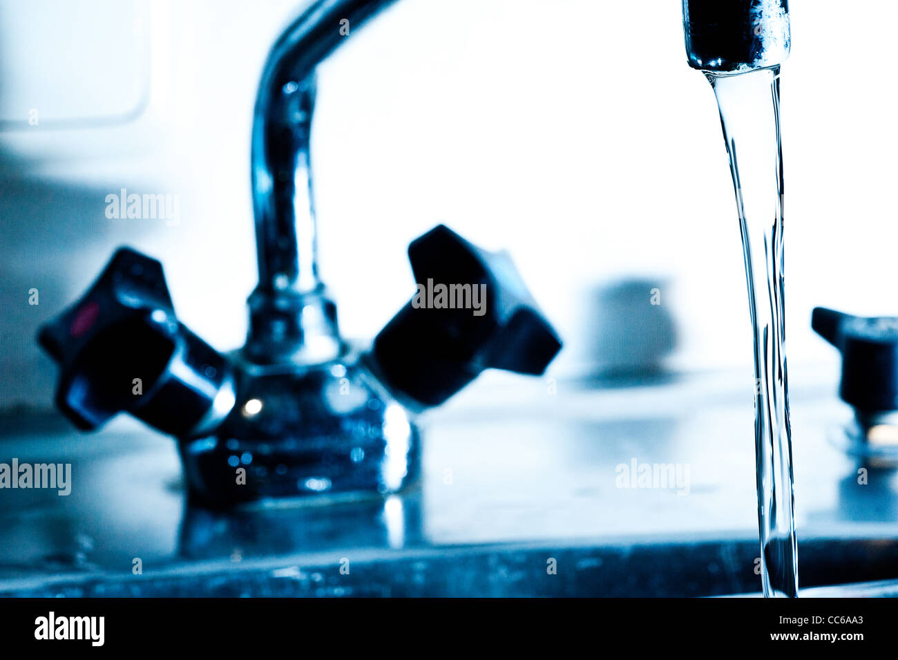 water running from the kitchen tap Stock Photo - Alamy