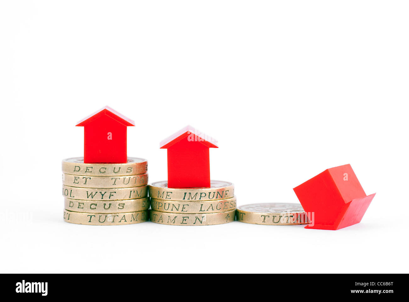 Plastic houses stacks money Cut Out Stock Images & Pictures - Alamy