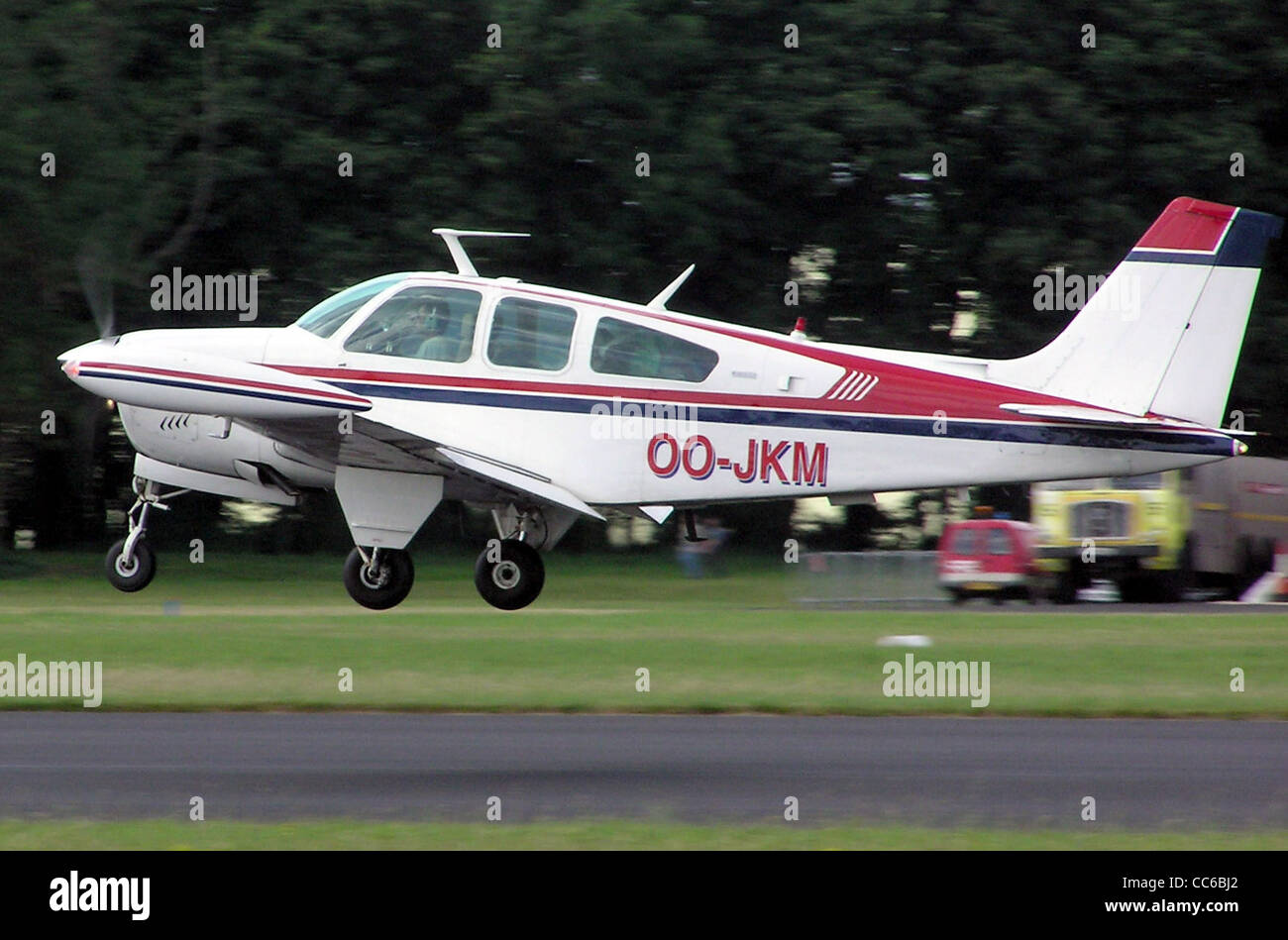 The Beechcraft Bonanza Be33 (OO-JKM) takes off from Kemble Airfield in ...