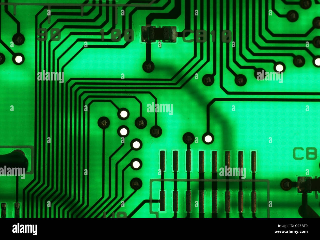 Electronics technology background in green Stock Photo - Alamy