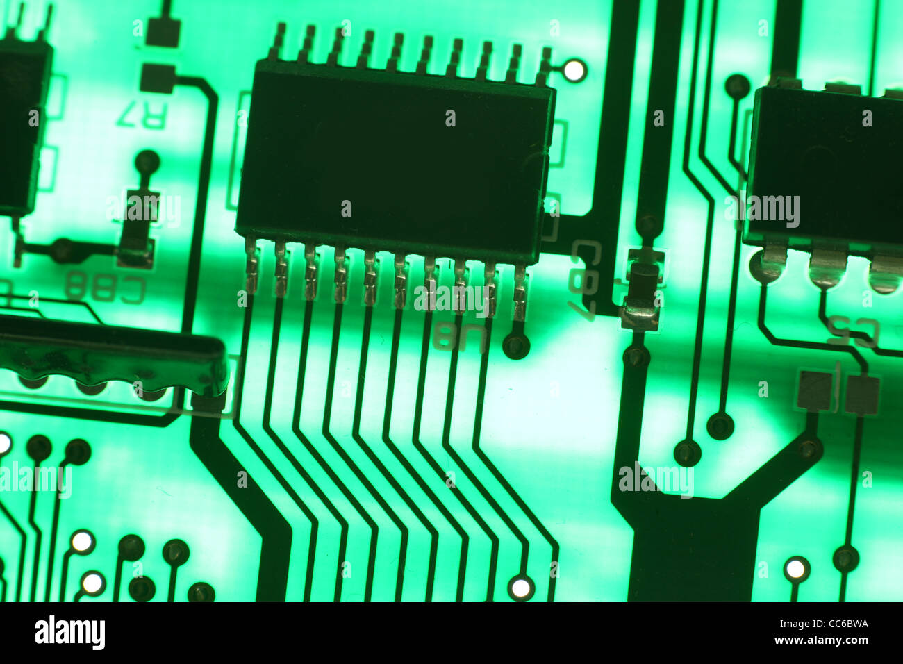 Electronics technology background in green Stock Photo - Alamy