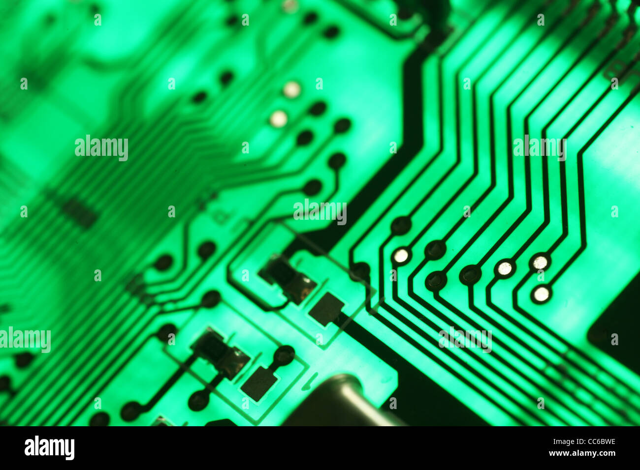Electronics technology background in green Stock Photo - Alamy