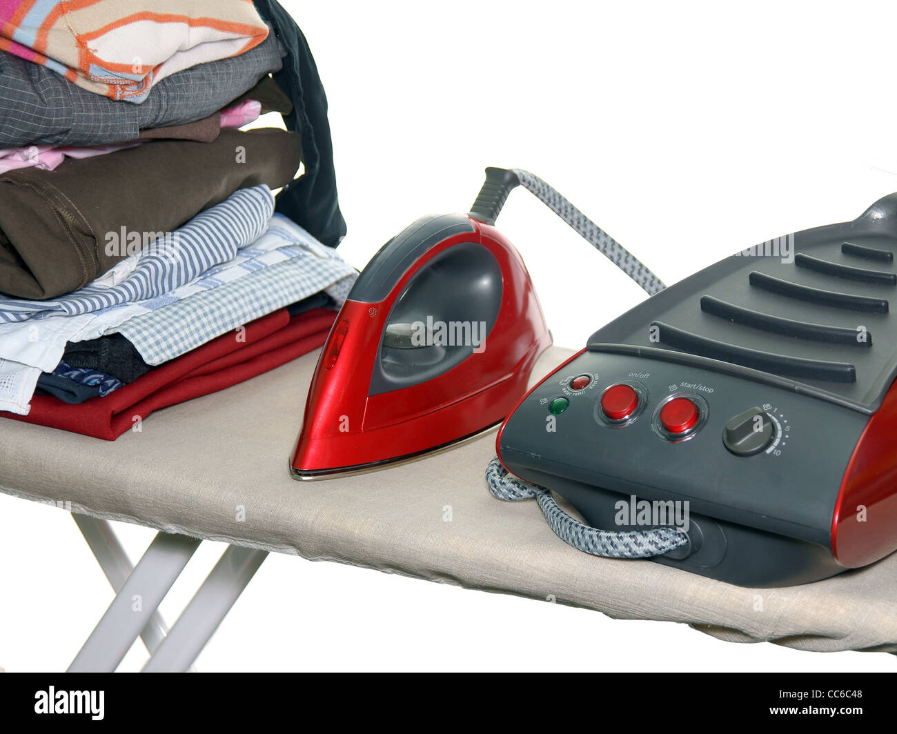 pile of ironing on white background Stock Photo - Alamy