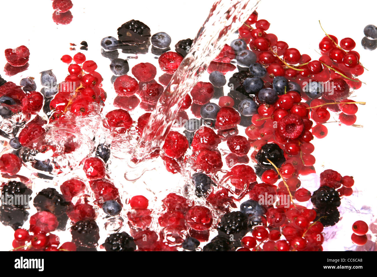 Fruits mix and water Stock Photo - Alamy
