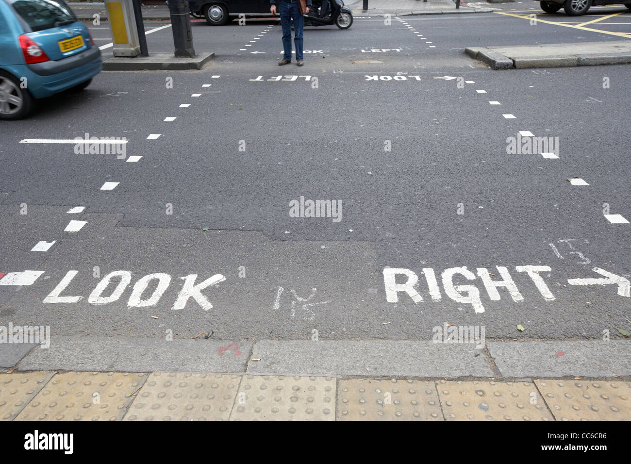 look right painted on the road at a pedestrian crossing in London ...