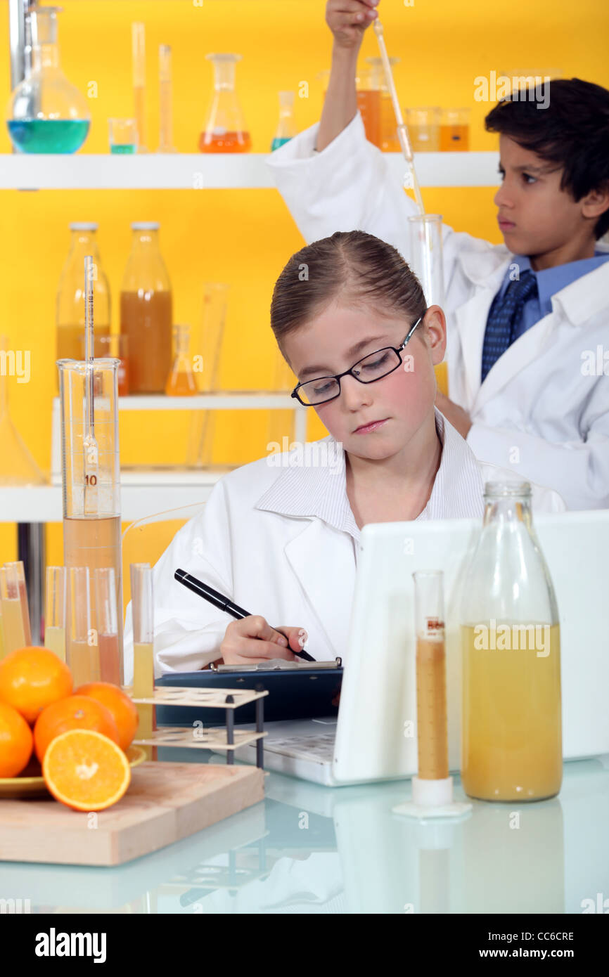 Two children in laboratory Stock Photo - Alamy