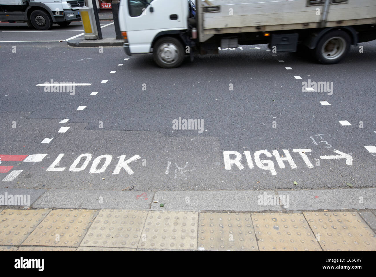 look right painted on the road at a pedestrian crossing in London ...