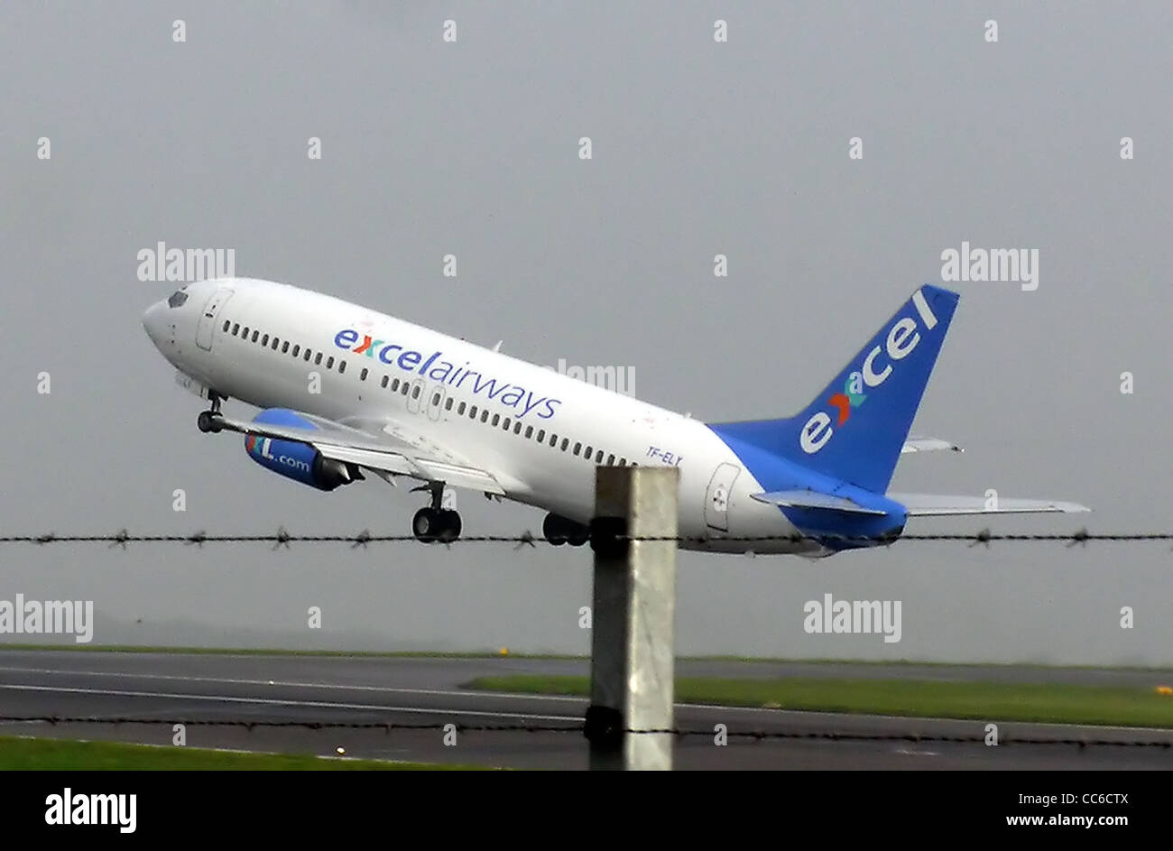 An Excel Airways Boeing 737-400 (TF-ELY) takes off from Bristol Airport ...
