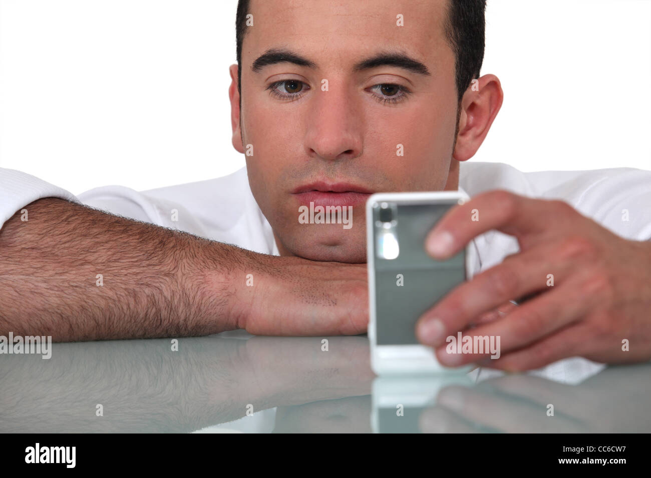 man waiting for a call on his cell Stock Photo - Alamy