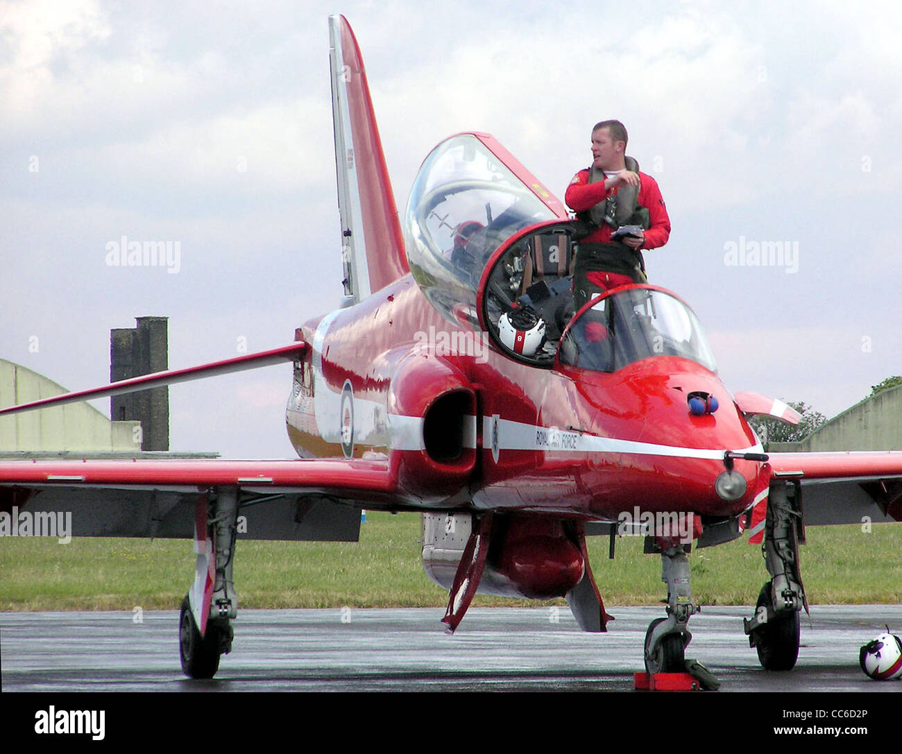 A Red Arrows pilot exits his Hawk aircraft after completing a ...