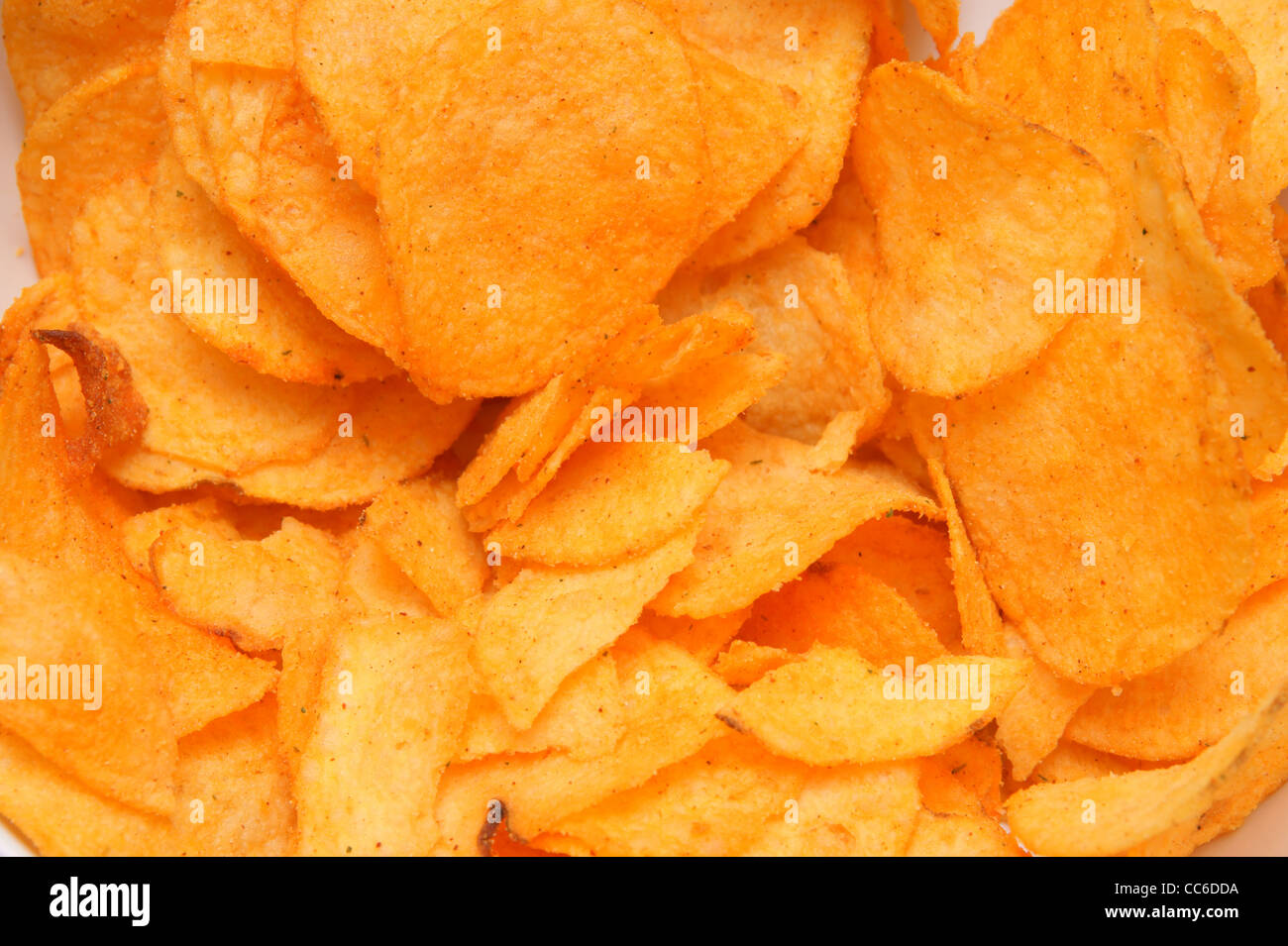 crunchy golden chips background Stock Photo - Alamy