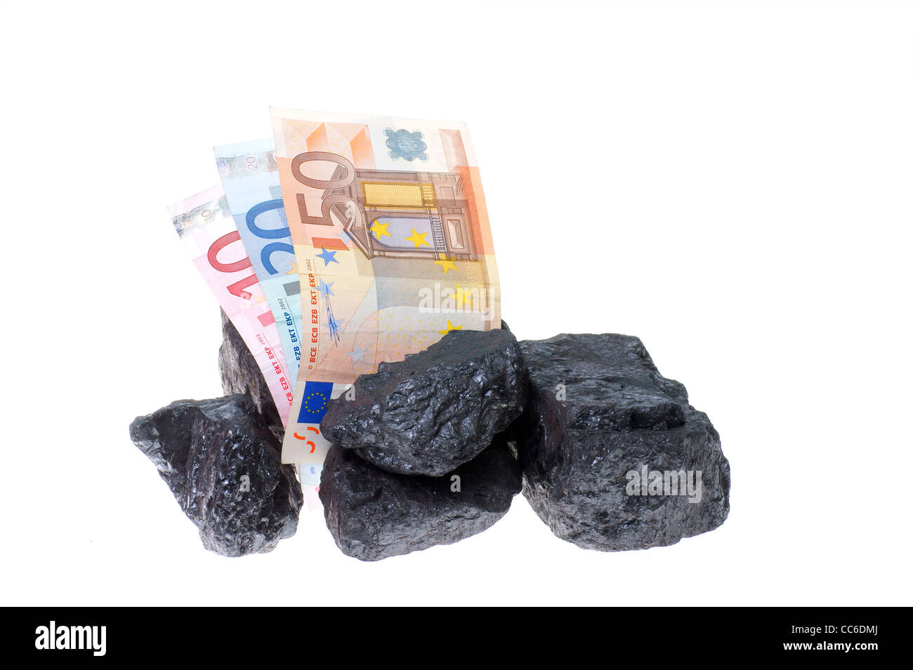 coal, carbon nuggets and euro banknote Stock Photo - Alamy