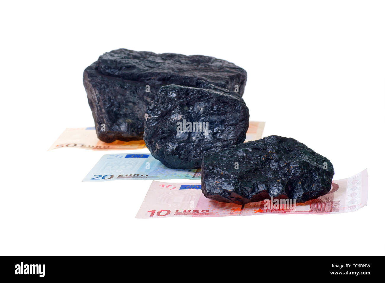 coal, carbon nuggets and euro banknote Stock Photo - Alamy