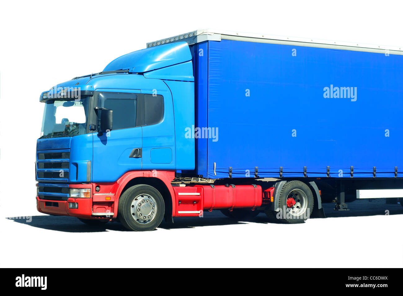 Big blue truck isolated on the white background Stock Photo - Alamy