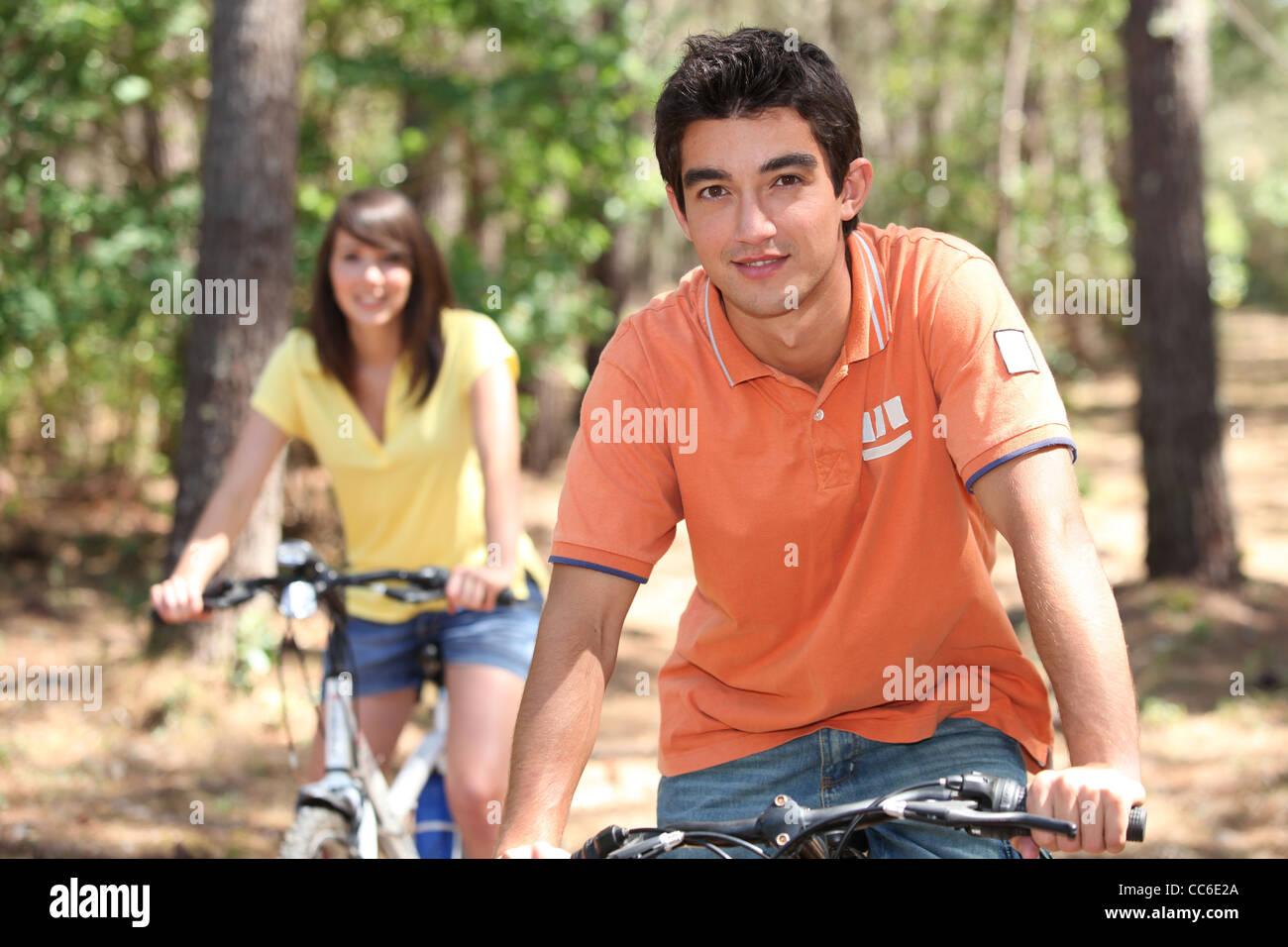 young people riding bikes Stock Photo - Alamy