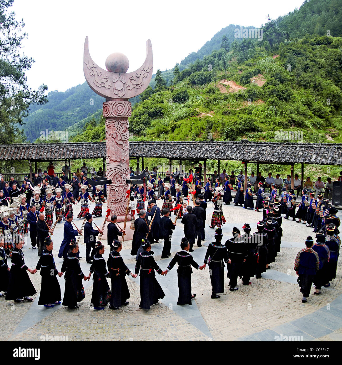 Miao women performing traditional dance, Nanhua Miao Village ...