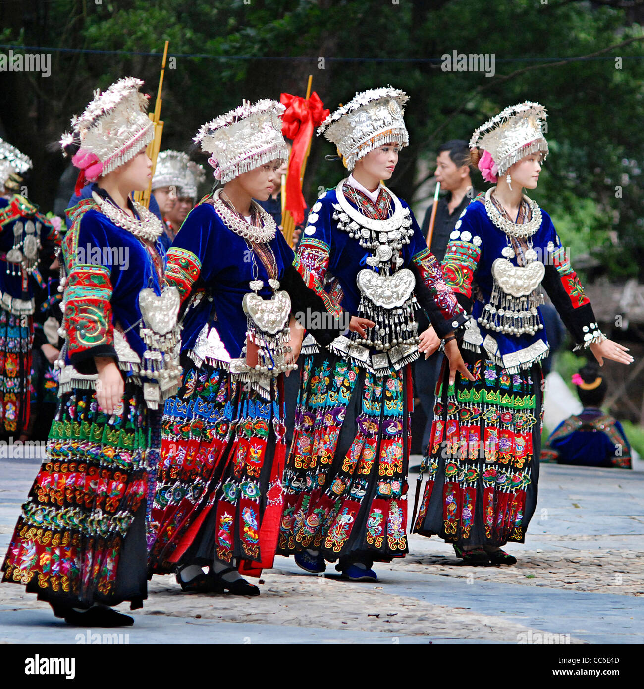 Miao women performing traditional dance, Nanhua Miao Village ...