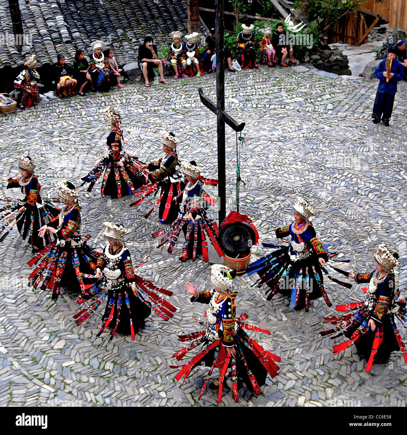 Miao women performing traditional dance, Nanhua Miao Village ...
