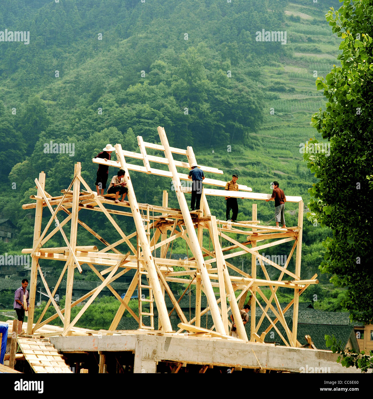 Locals build a traditional house, Nanhua Miao Village, Qiandongnan Miao ...